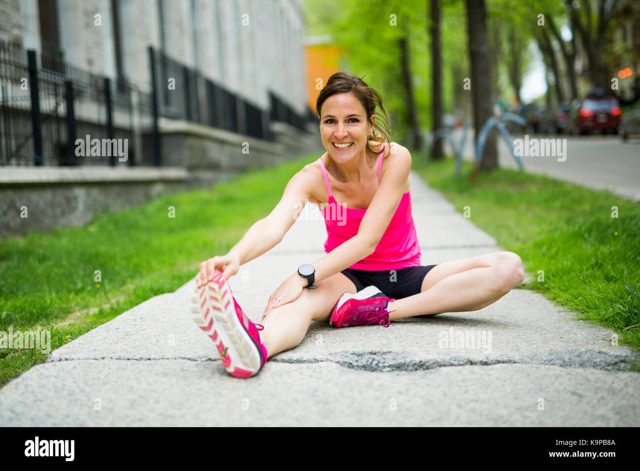 A nice portrait of a woman jogging outdoors Stock Photo - Alamy