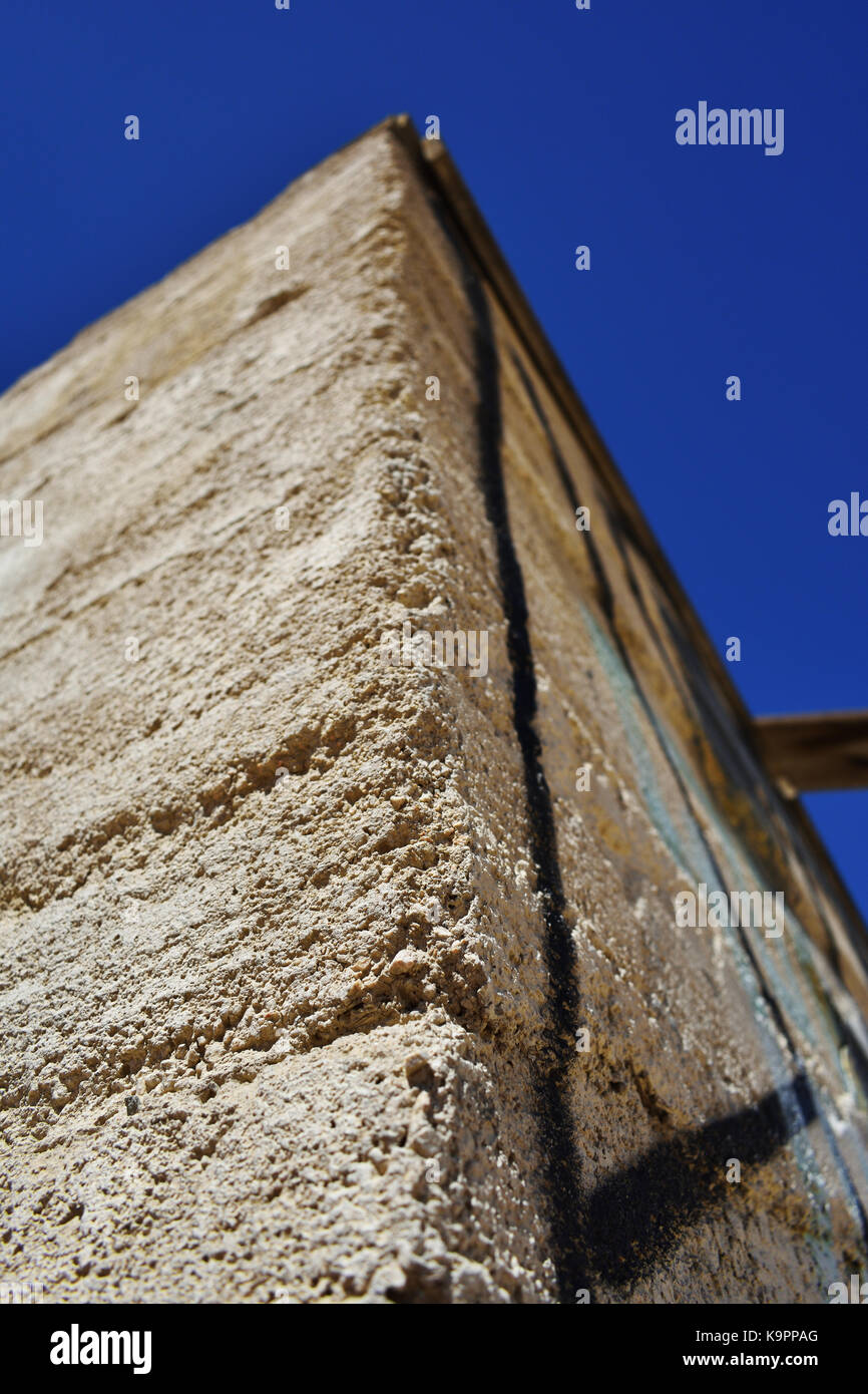 Close up of ruined stone building in the desert. Rust and decay Stock ...
