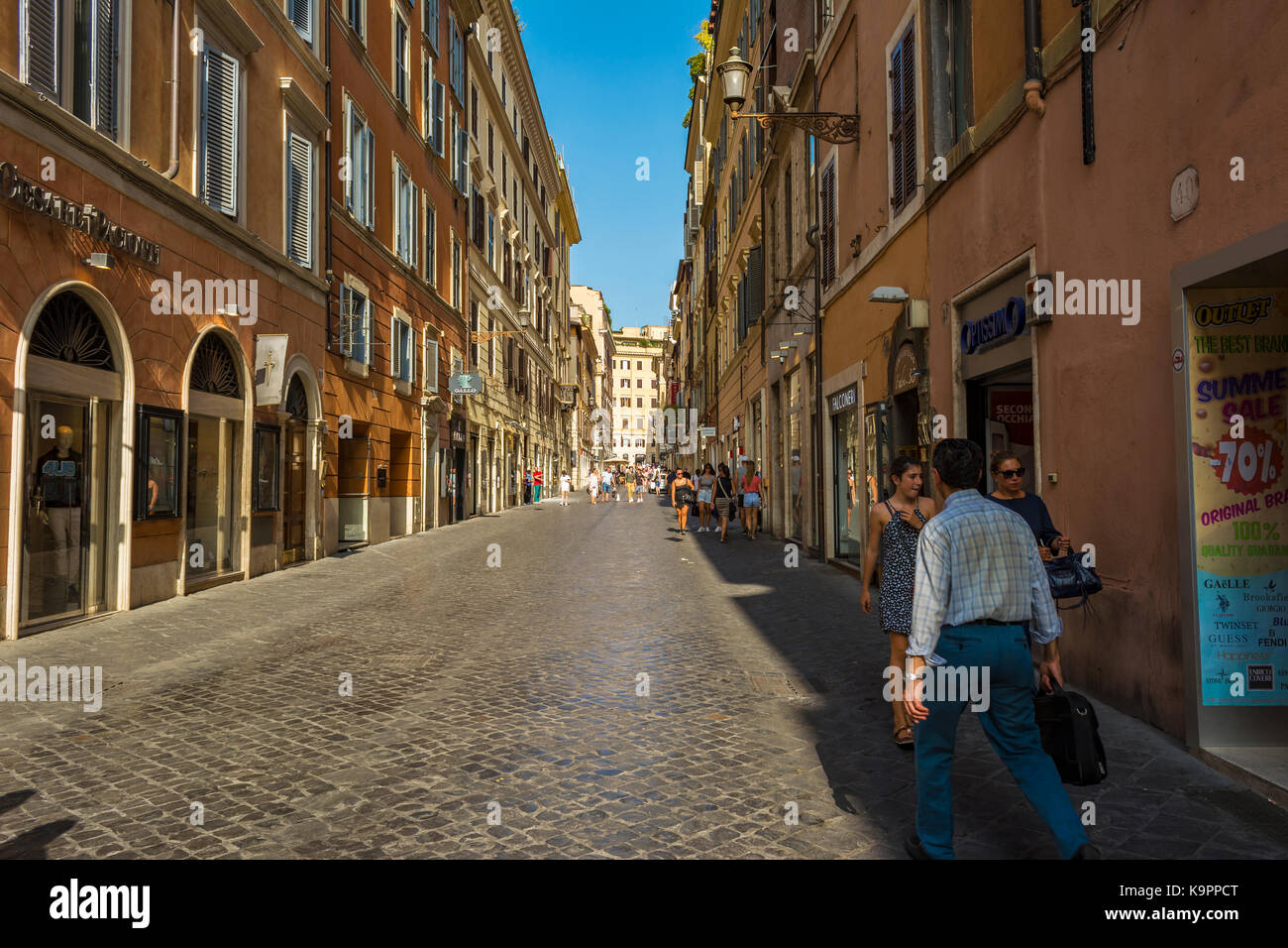 ROME, ITALY - AUGUST 30, 2017 - An crowded commercial paved street in ...