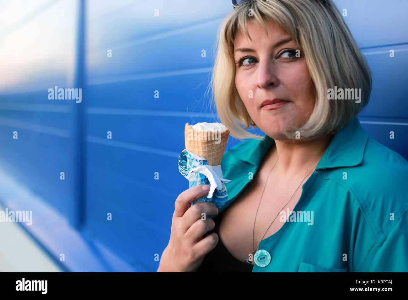 woman eating ice cream Stock Photo - Alamy
