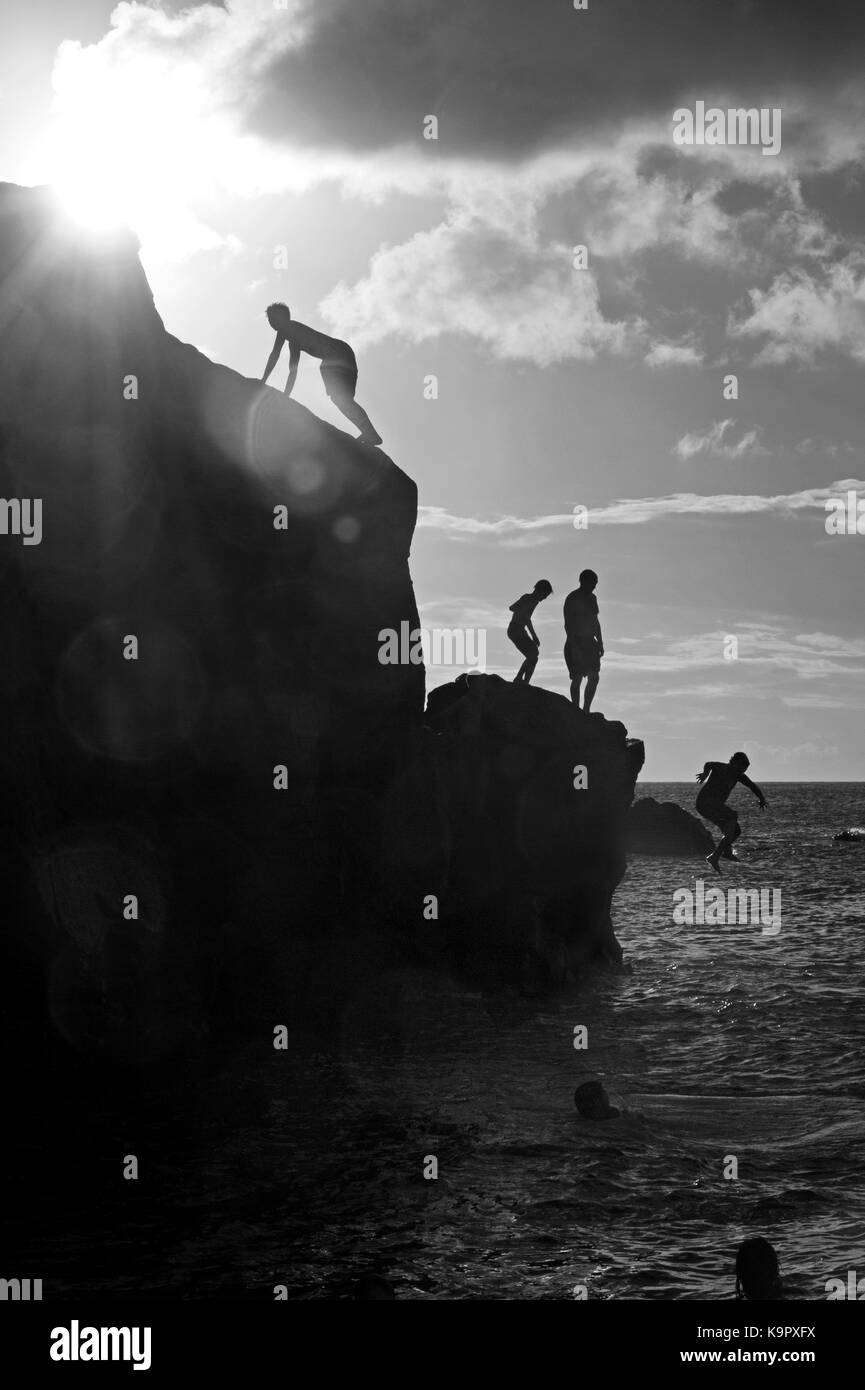 Cliff Jumping Into Ocean Sunset High Resolution Stock Photography and ...