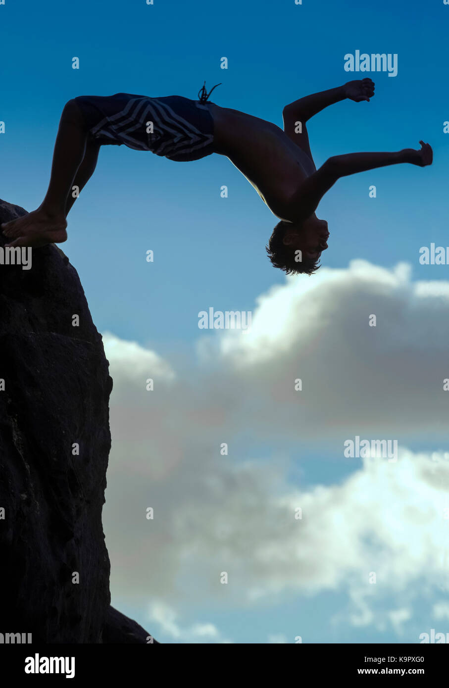 Cliff Jumping Into Ocean Sunset High Resolution Stock Photography and ...
