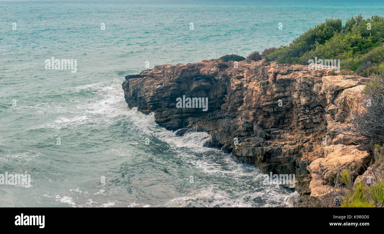 Cliff in the sea Stock Photo - Alamy