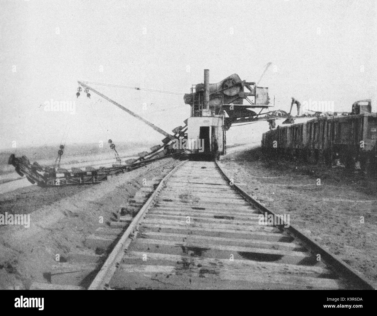 P417a The excavator at work, digging a channel for drainage Stock Photo ...