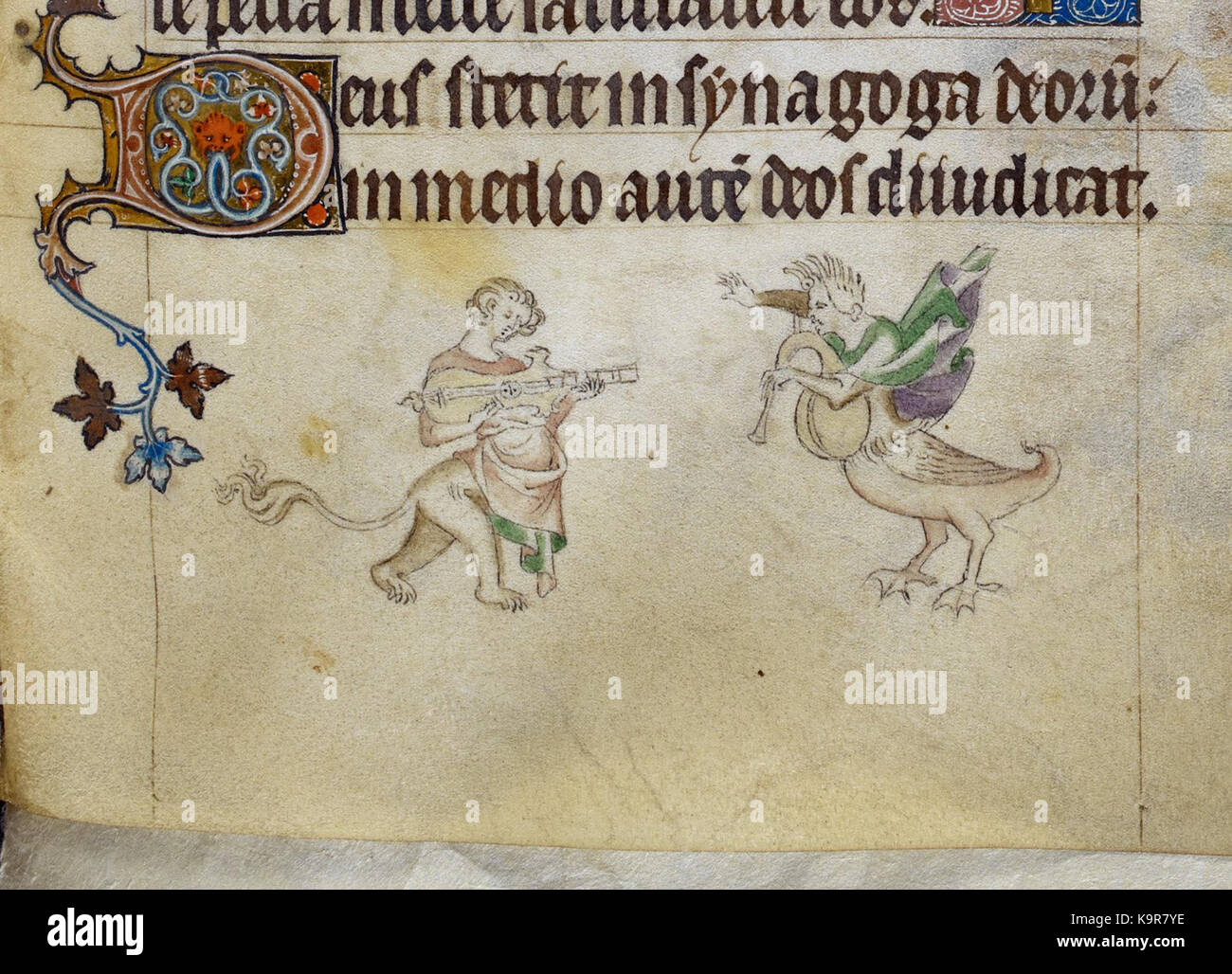 Queen Mary Psalter grotesques playing citole and horn Stock Photo - Alamy