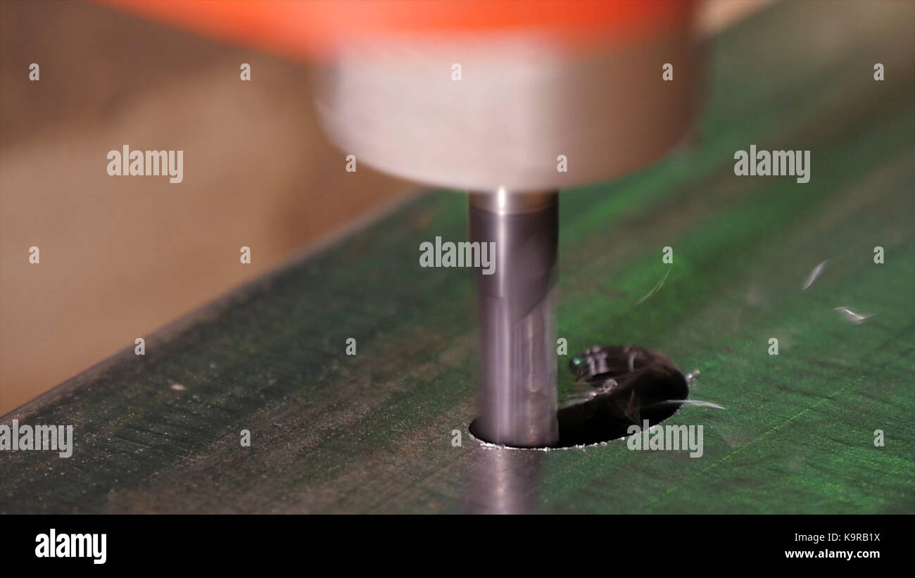 Employee drilling hole in flat hi-res stock photography and images - Alamy