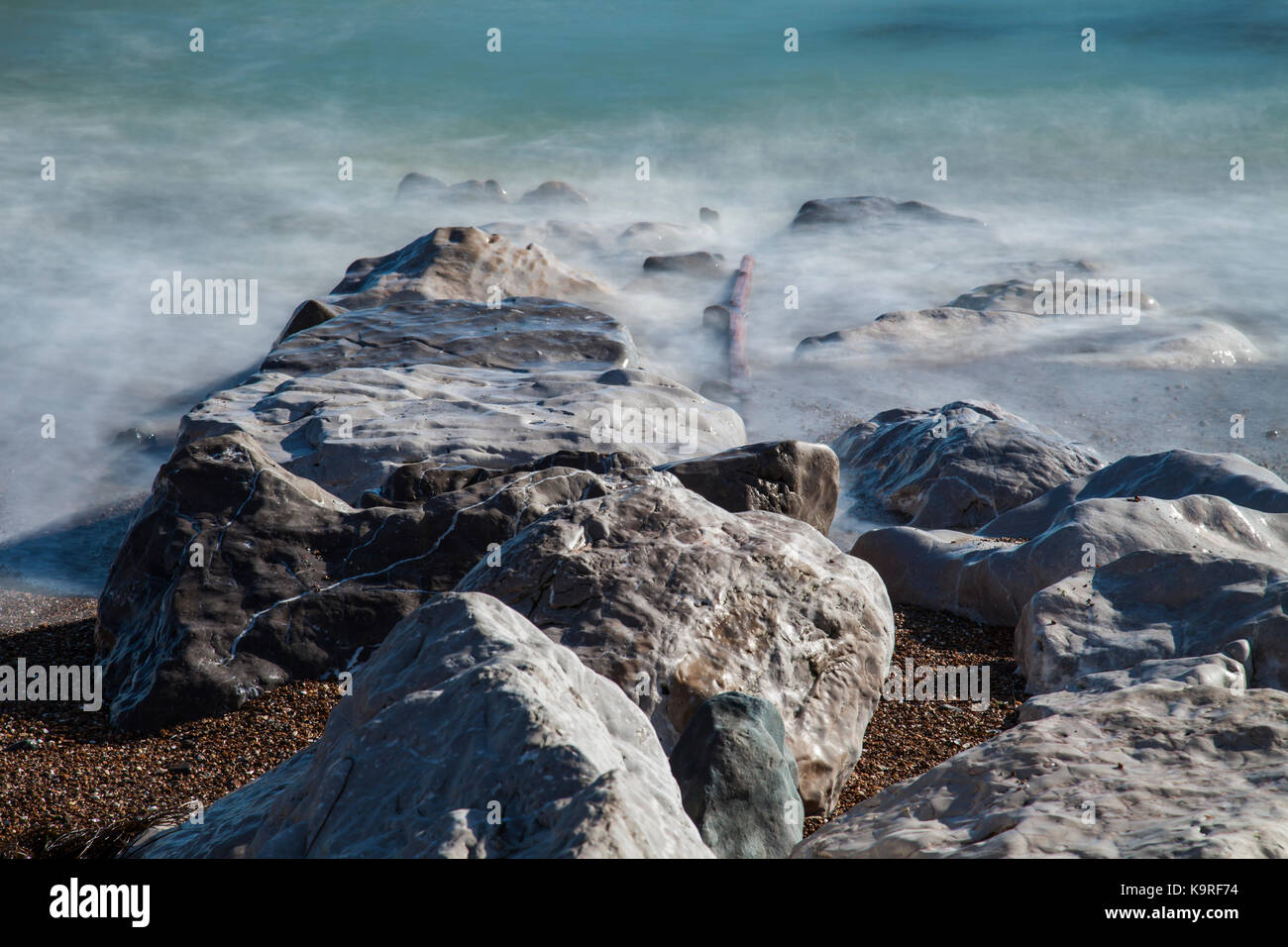 Boulders on the beach in Worthing, West Sussex Stock Photo - Alamy
