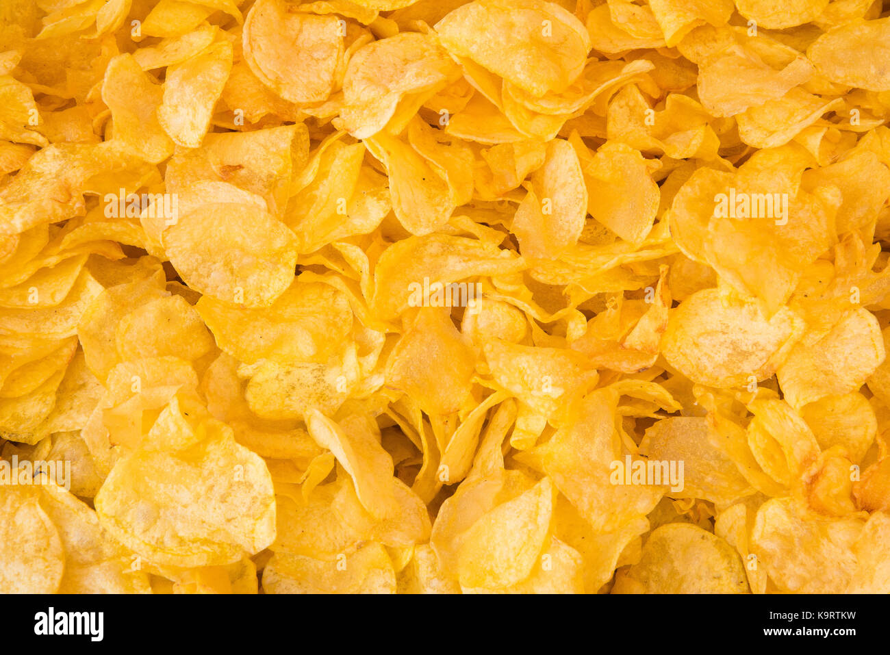 Delicious freshly cooked chips to use as background or texture Stock ...
