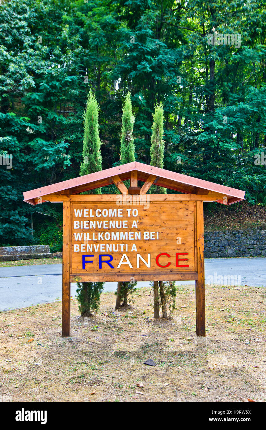 wooden signboard that announces the welcome in France to tourists and ...