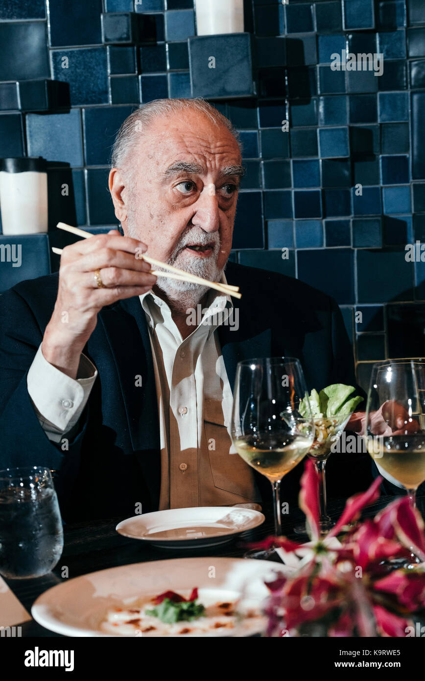 Manos Angelakis from LuxuryWeb having dinner at NOBU FIFTY SEVEN Stock ...