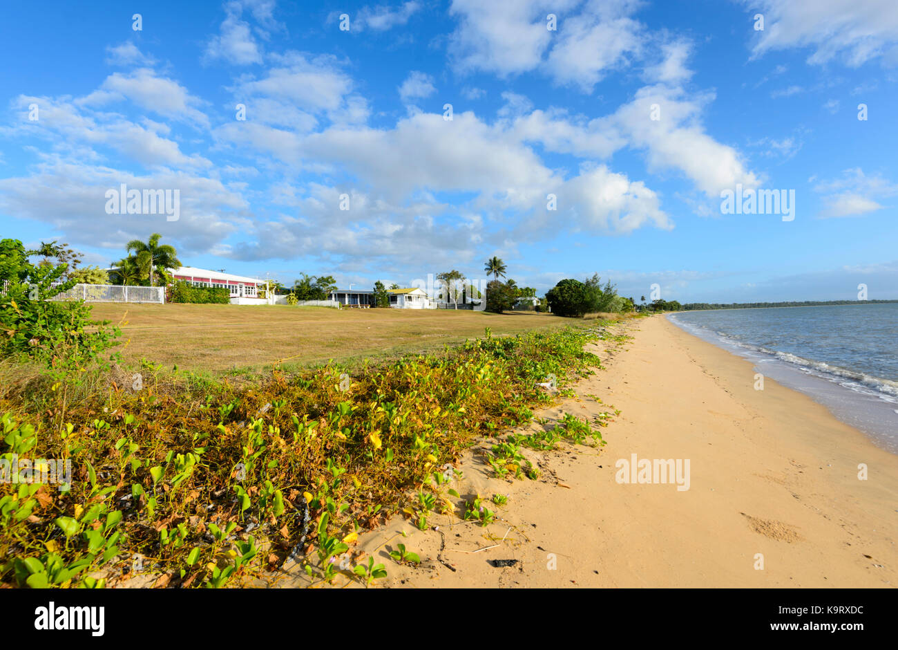 Sandy beach of Cardwell and waterfront properties, Far North Queensland ...