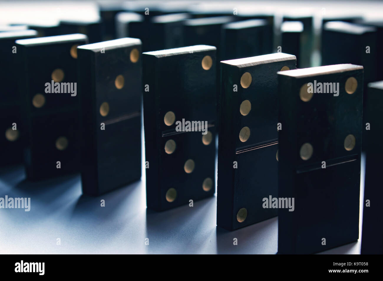 Dominoes in a row hi-res stock photography and images - Alamy