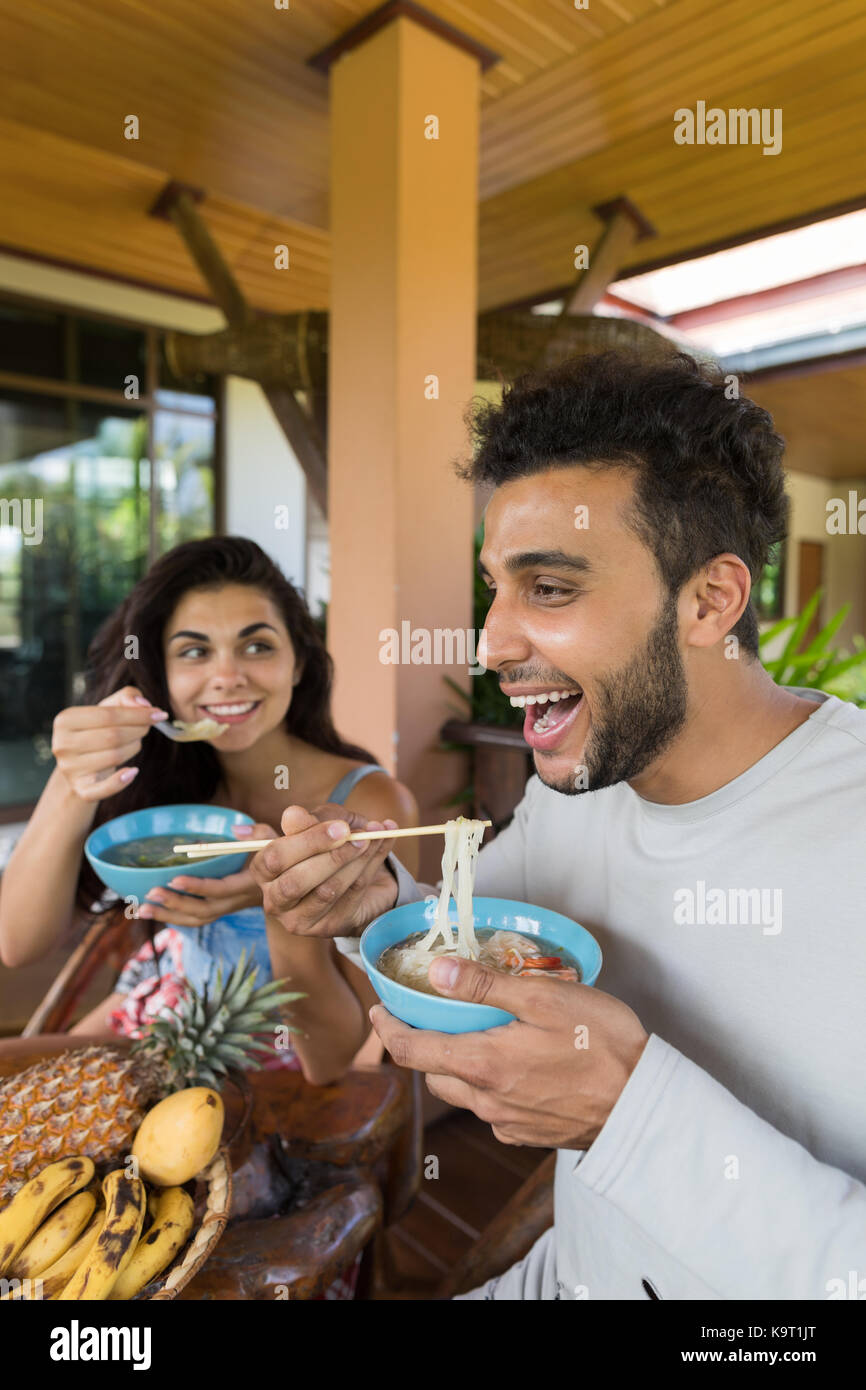 Young People Eating Chinese Noodles Happy Smiling Stock Photo - Alamy