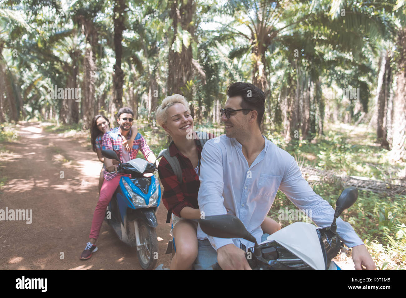 Happy People Ride Scooter Enjoy Summer Vacation While Road Trip Through ...
