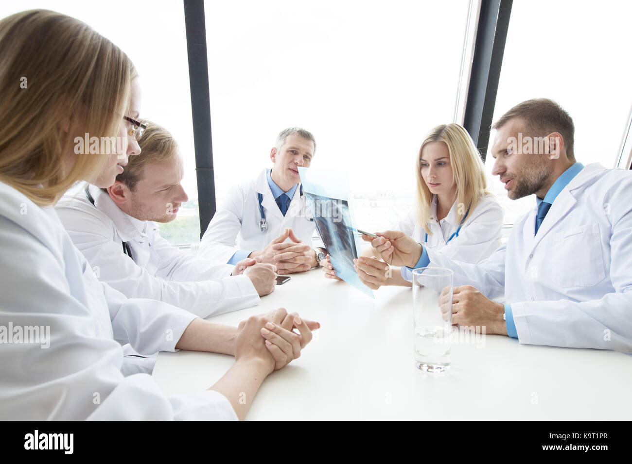 Clinic, people, healthcare and medicine concept - group of medics with ...
