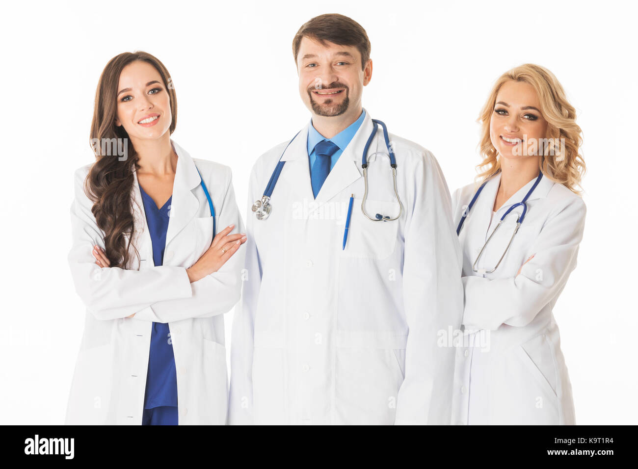 Medical doctors group isolated on white background Stock Photo - Alamy