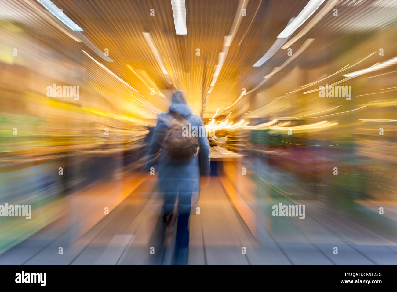 Woman entering the store, female walking Stock Photo - Alamy