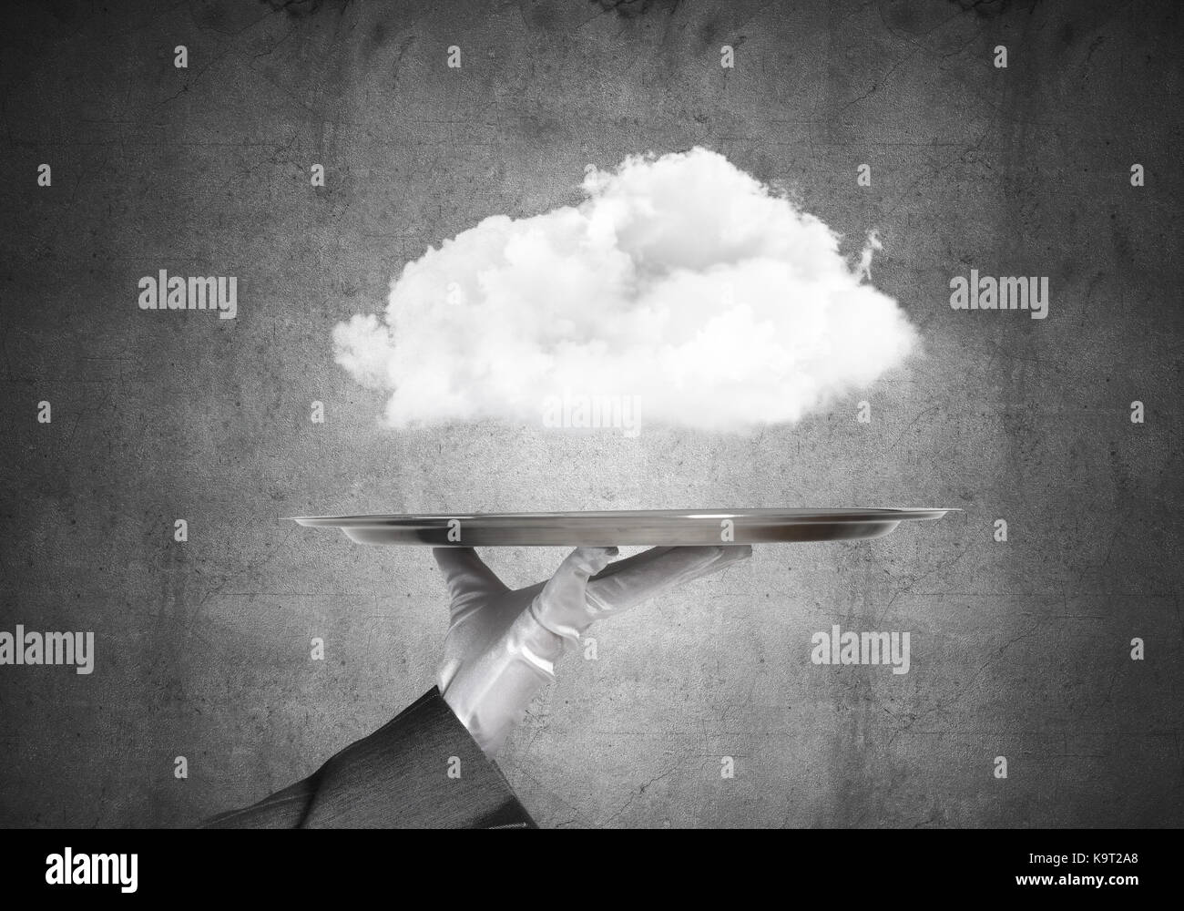 Hand of waitress presenting cloud on tray Stock Photo - Alamy
