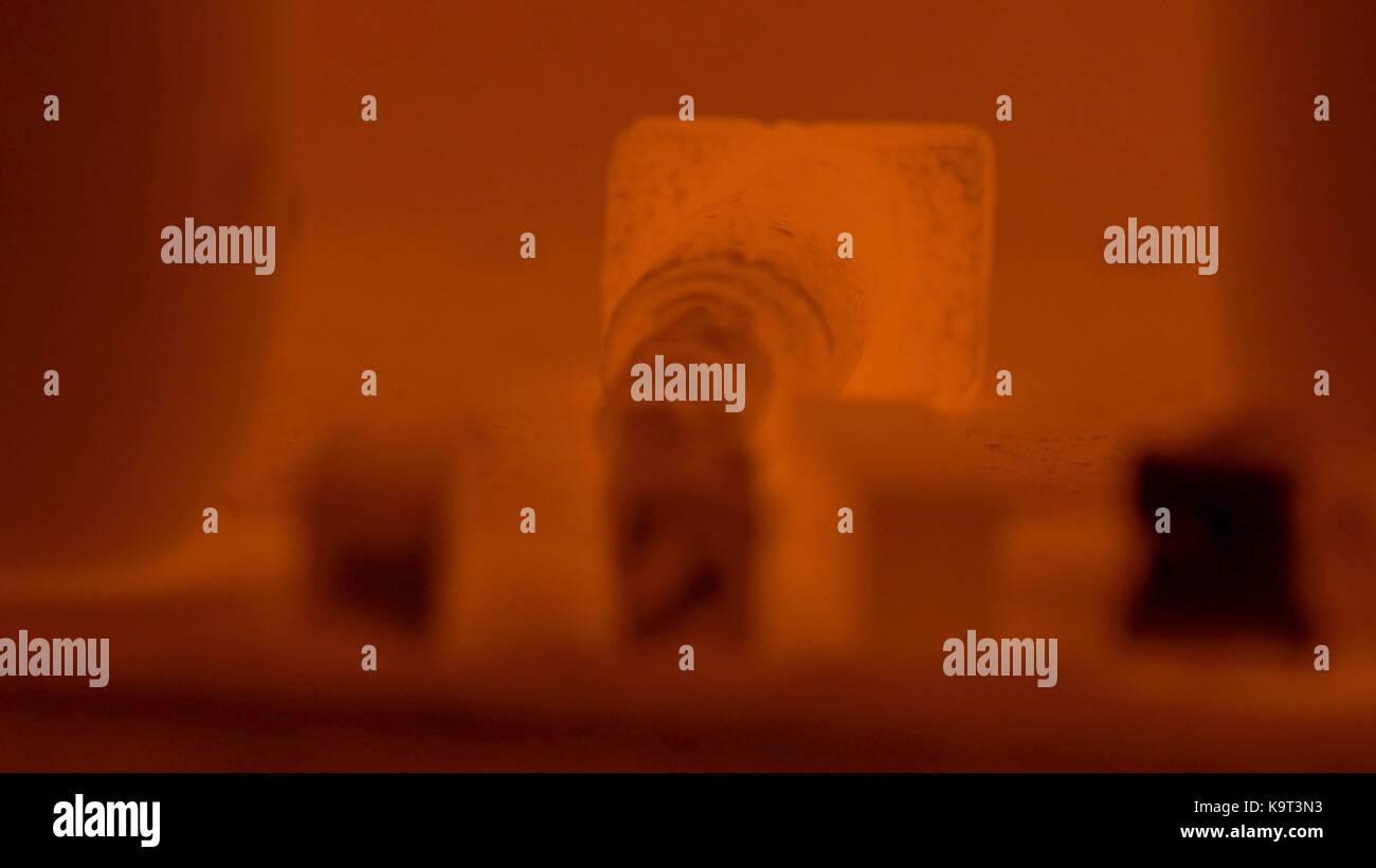 Metal details inside a furnace. Steel parts inside the furnace ...