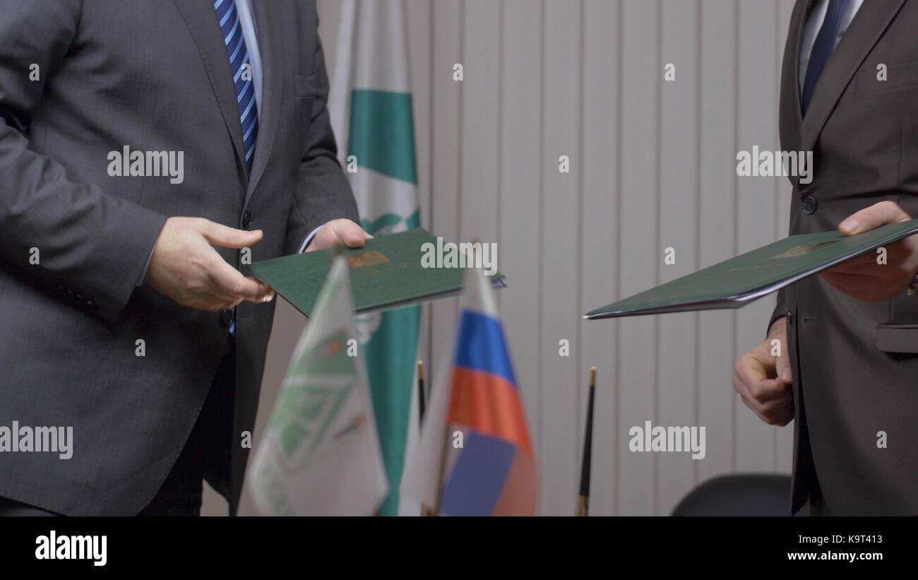 Two businessman with made a deal. Two businessmen shaking hands ...