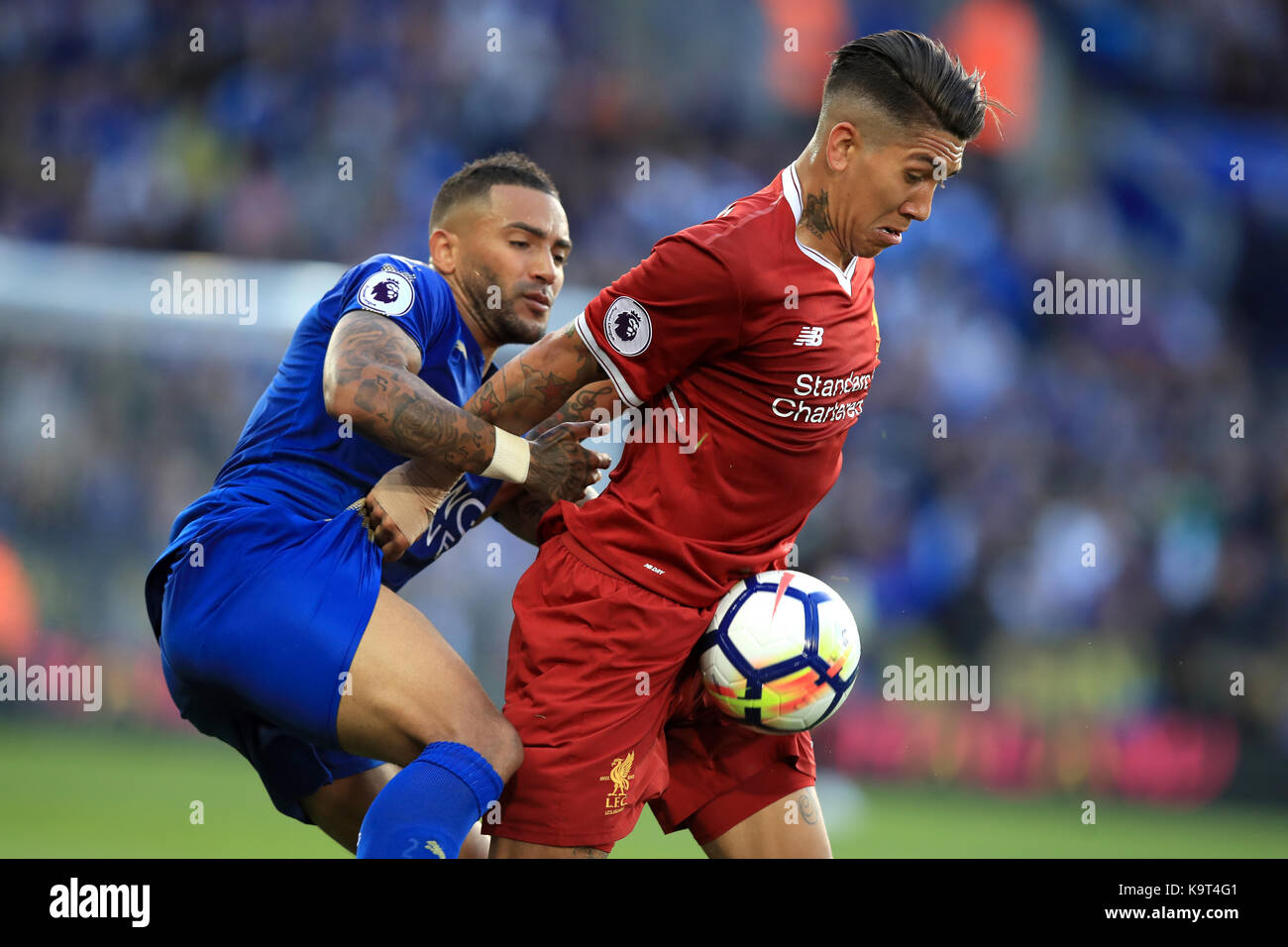 Leicester City's Danny Simpson (left) and Liverpool's Emre Can battle ...