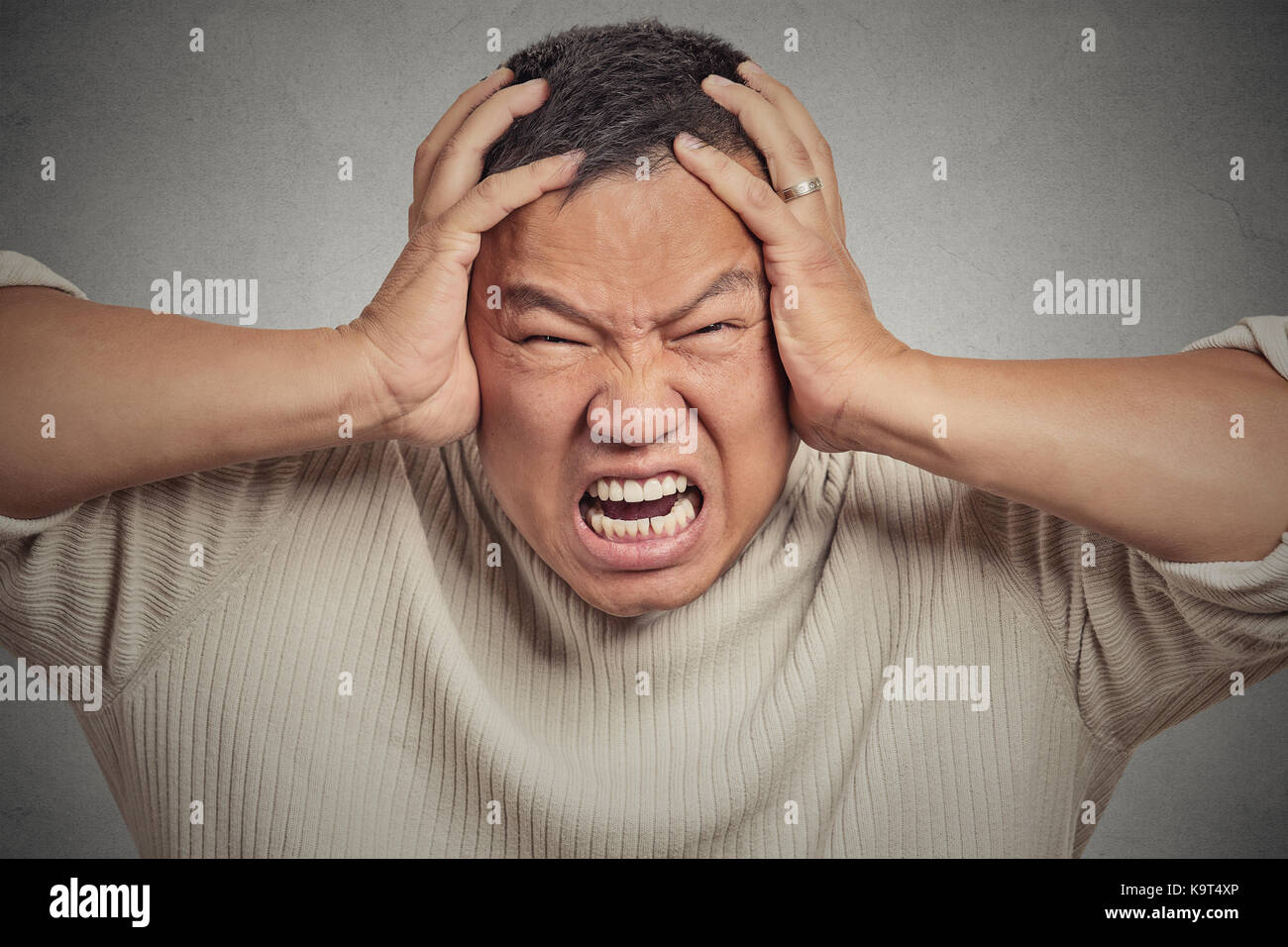 Chinese man face anger hi-res stock photography and images - Alamy