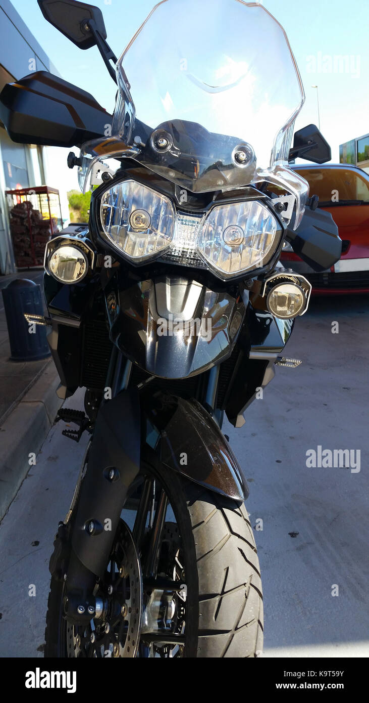 Black Adventure Motorcycle at a gas station in Barcelona, Spain Stock ...