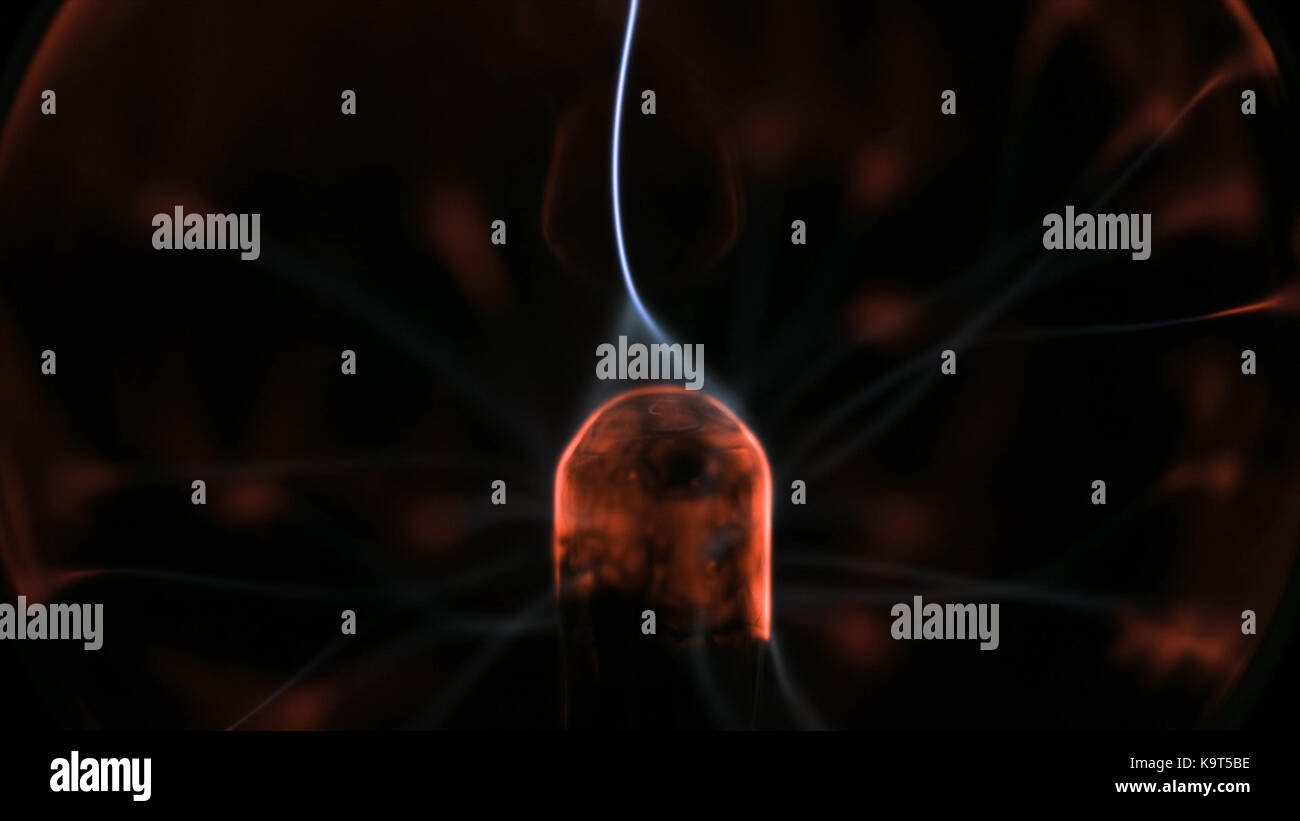 Hand touching a plasma ball. A Plasma ball lamp energy, hand touching ...