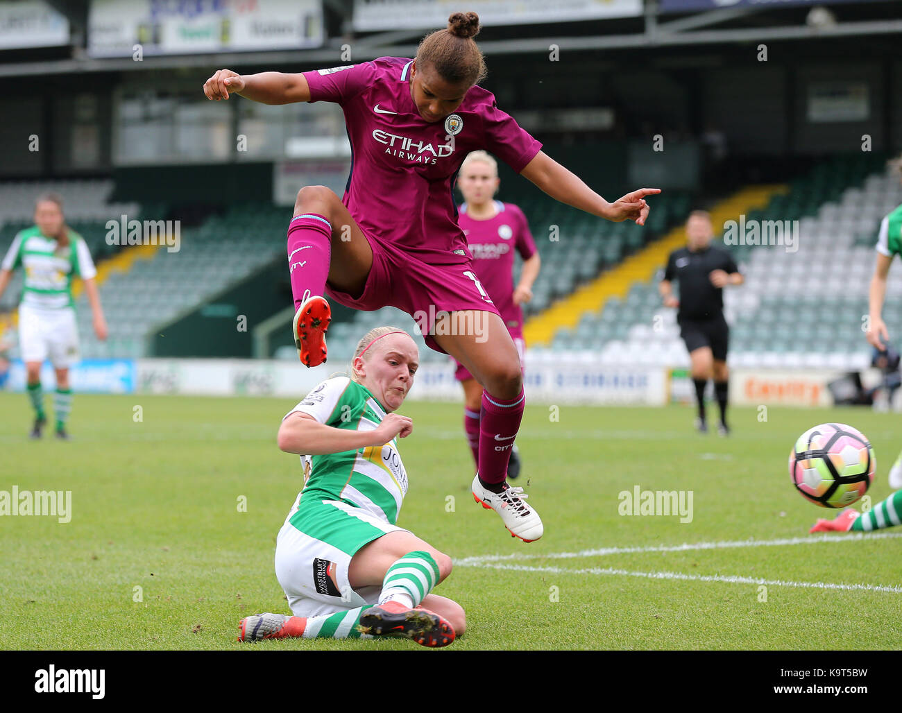 Manchester City's Nikita Parris jumps to avoid a tackle with Yeovil's ...