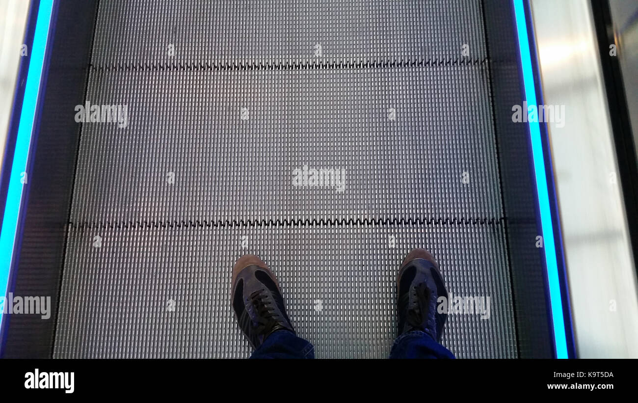 Moving escalator in shopping mall in Monaco Stock Photo - Alamy