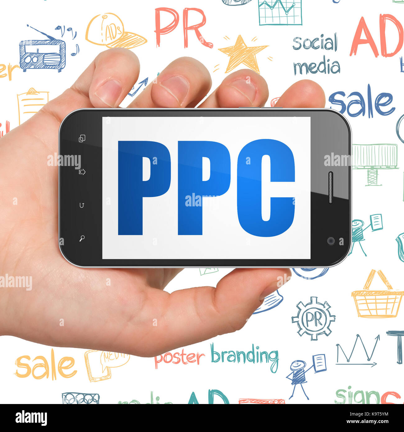 Advertising concept: Hand Holding Smartphone with PPC on display Stock ...