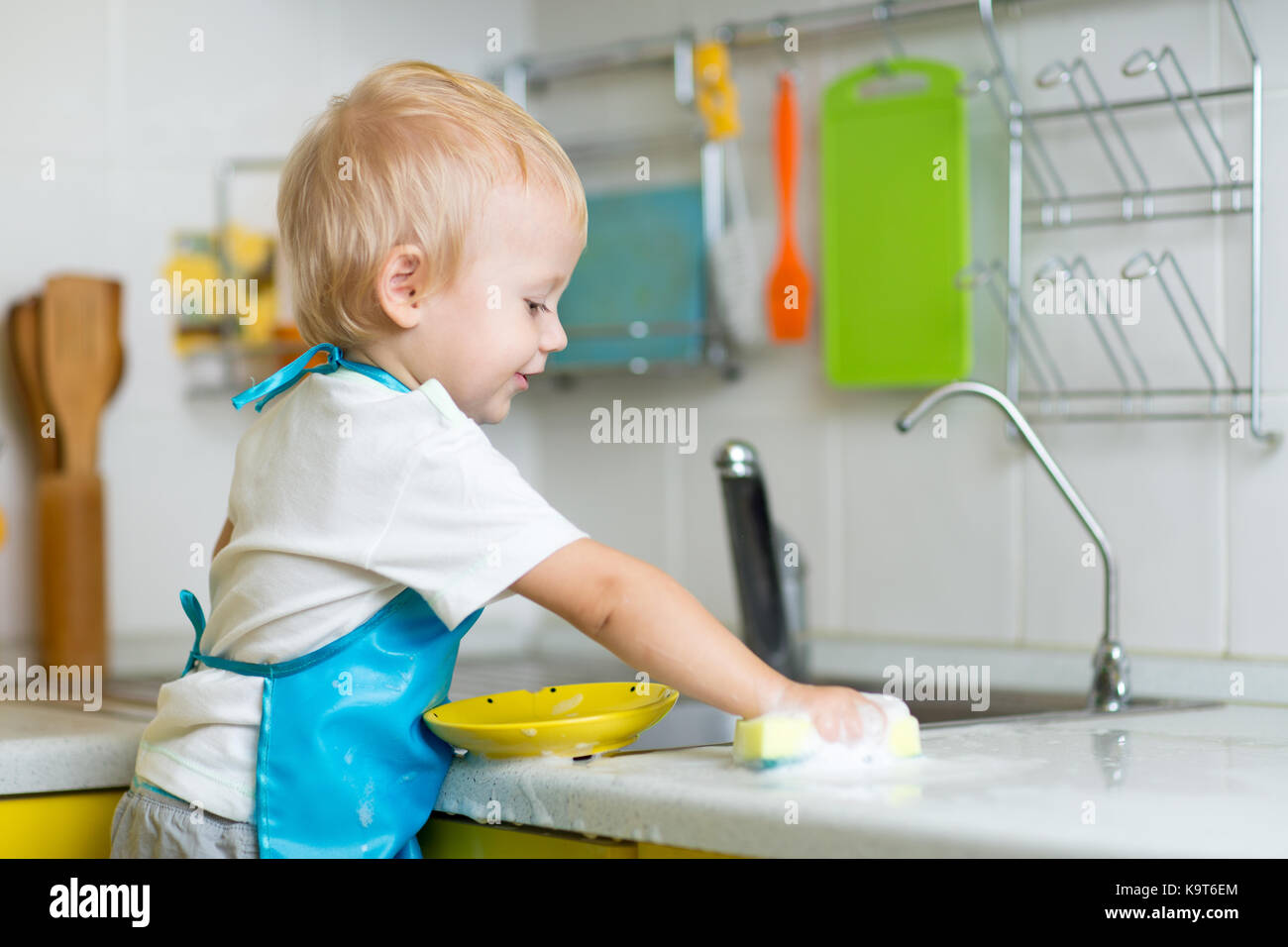 Household chores and boy hi-res stock photography and images - Alamy