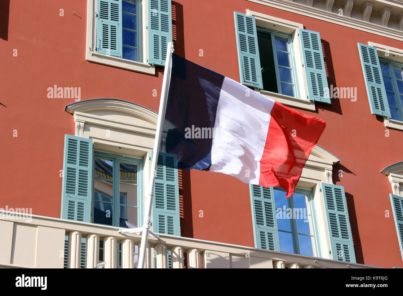 French Flag at Facade of Historic Building in the City of Nice, France ...