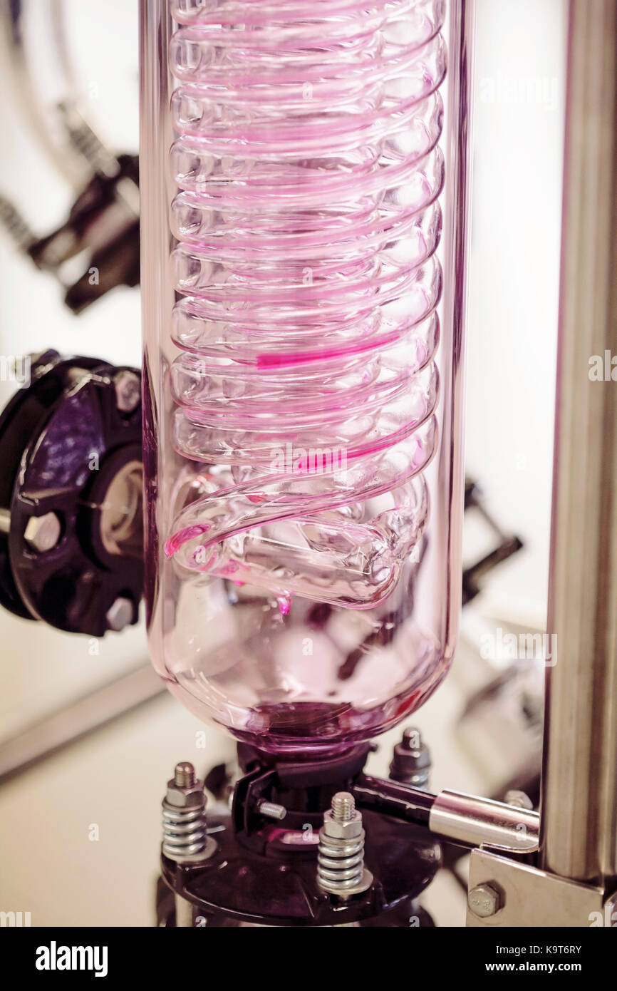 Laboratory chemical machine with moving red liquid Stock Photo - Alamy