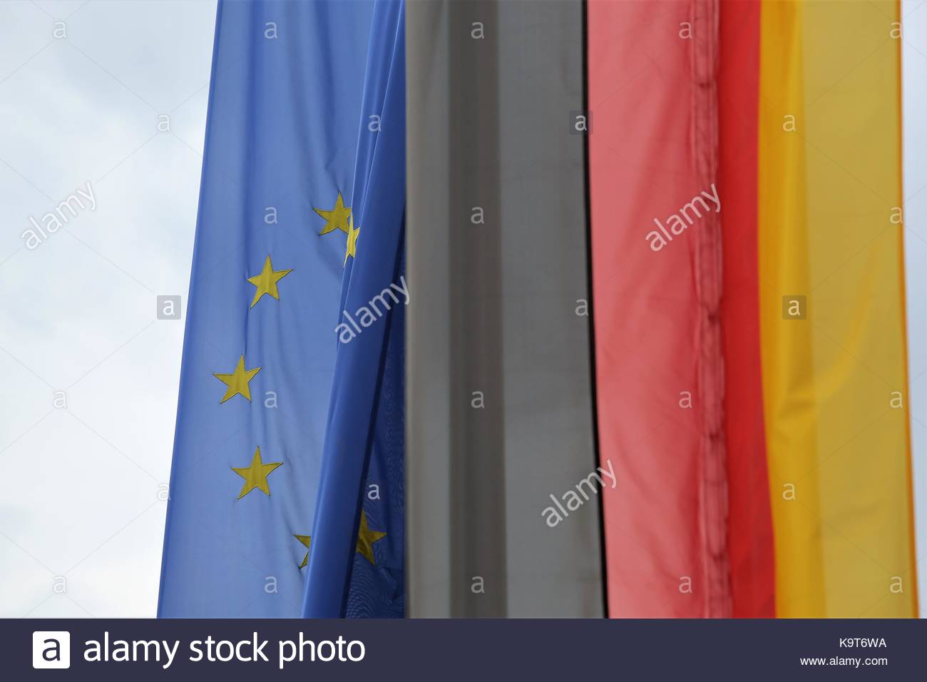 The EU and German flags side by side on a flagpole in the week of the ...