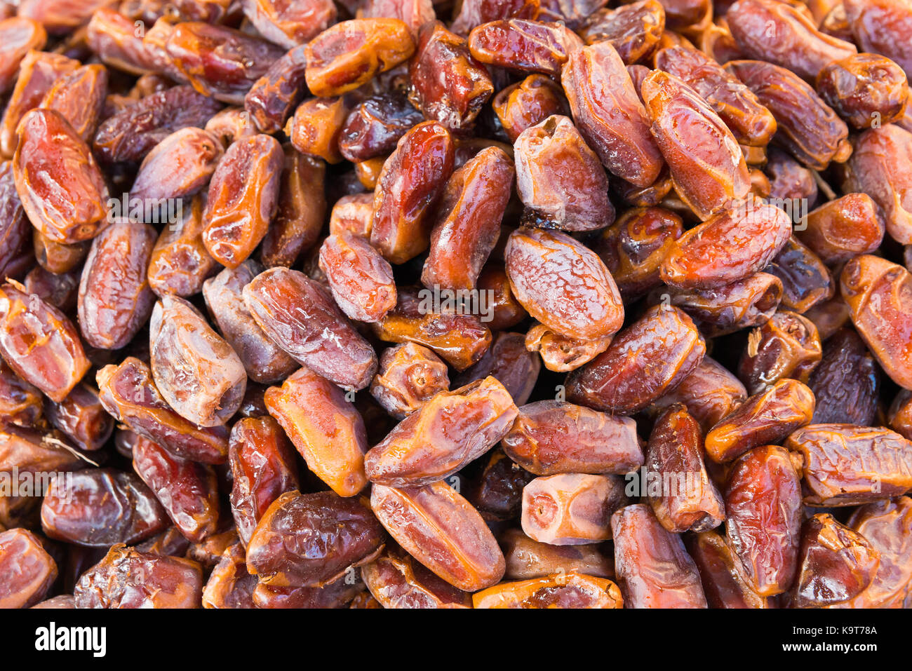 Close up of dates on street market. Top view Stock Photo - Alamy