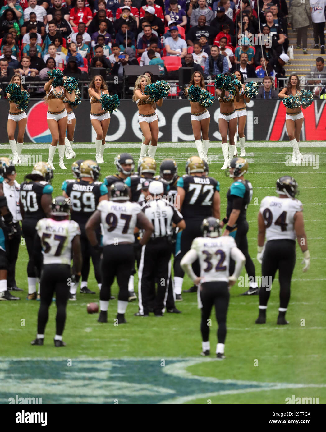 Jacksonville Jaguars cheerleaders perform during a break in play during ...