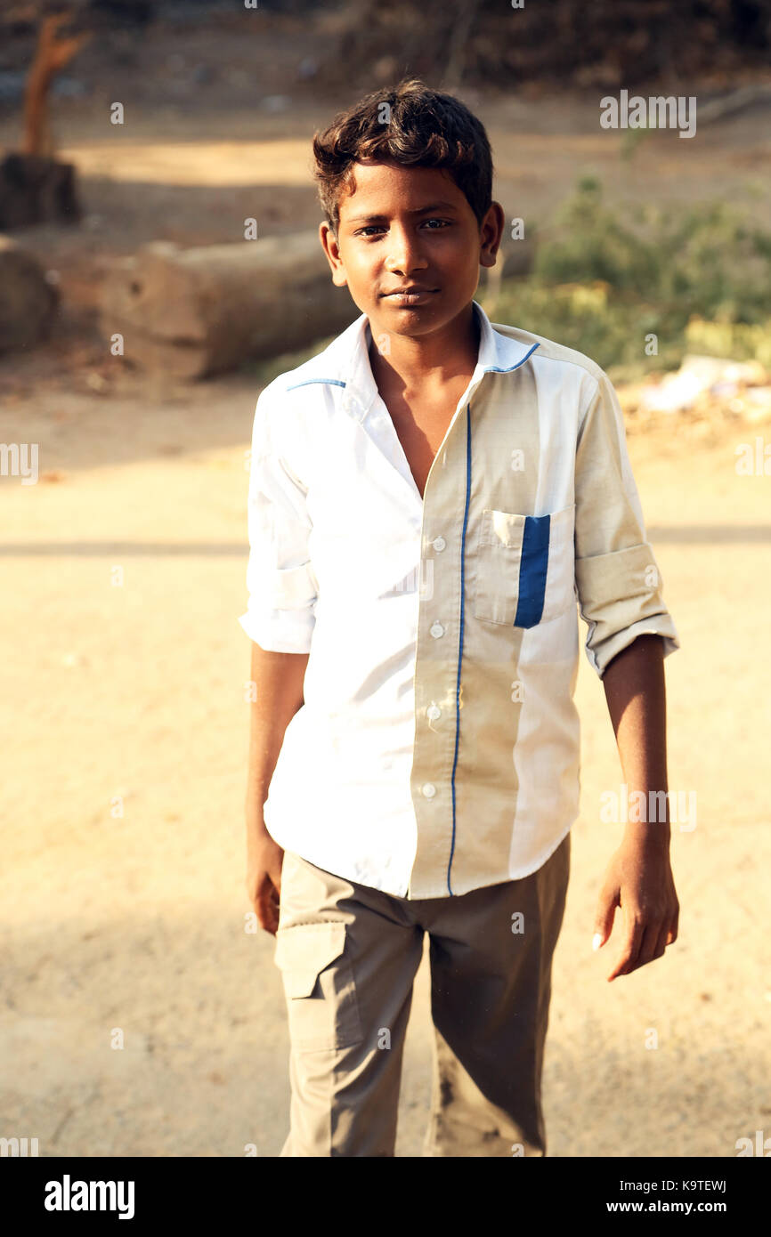 Portrait of unidentified Indian boy on the street Stock Photo - Alamy
