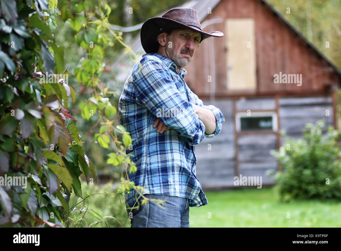cowboy man smoke pipe Stock Photo - Alamy