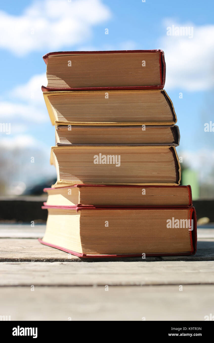 books standing on a table Stock Photo - Alamy