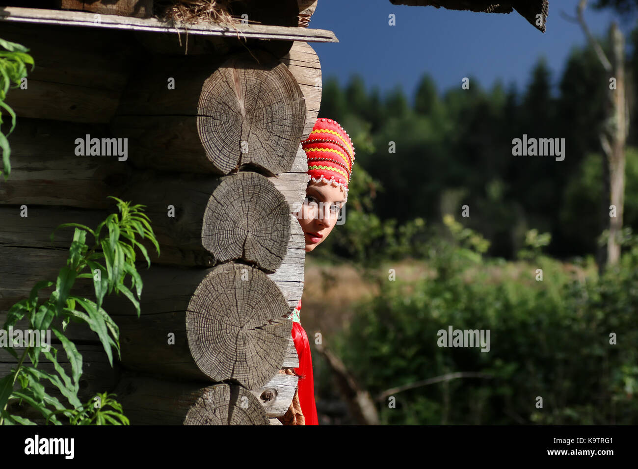 girl traditional dress log Stock Photo - Alamy