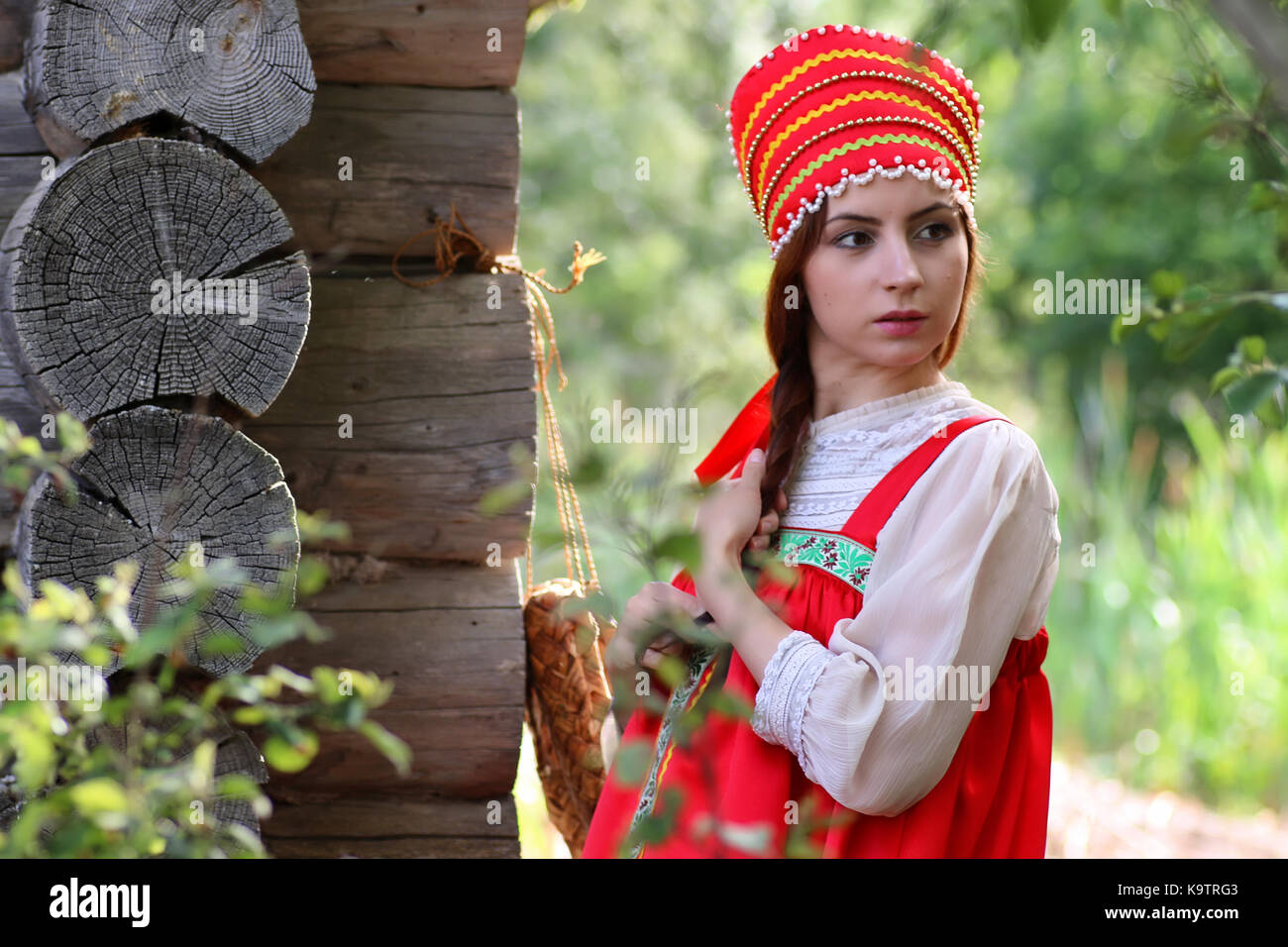 girl traditional dress log Stock Photo - Alamy