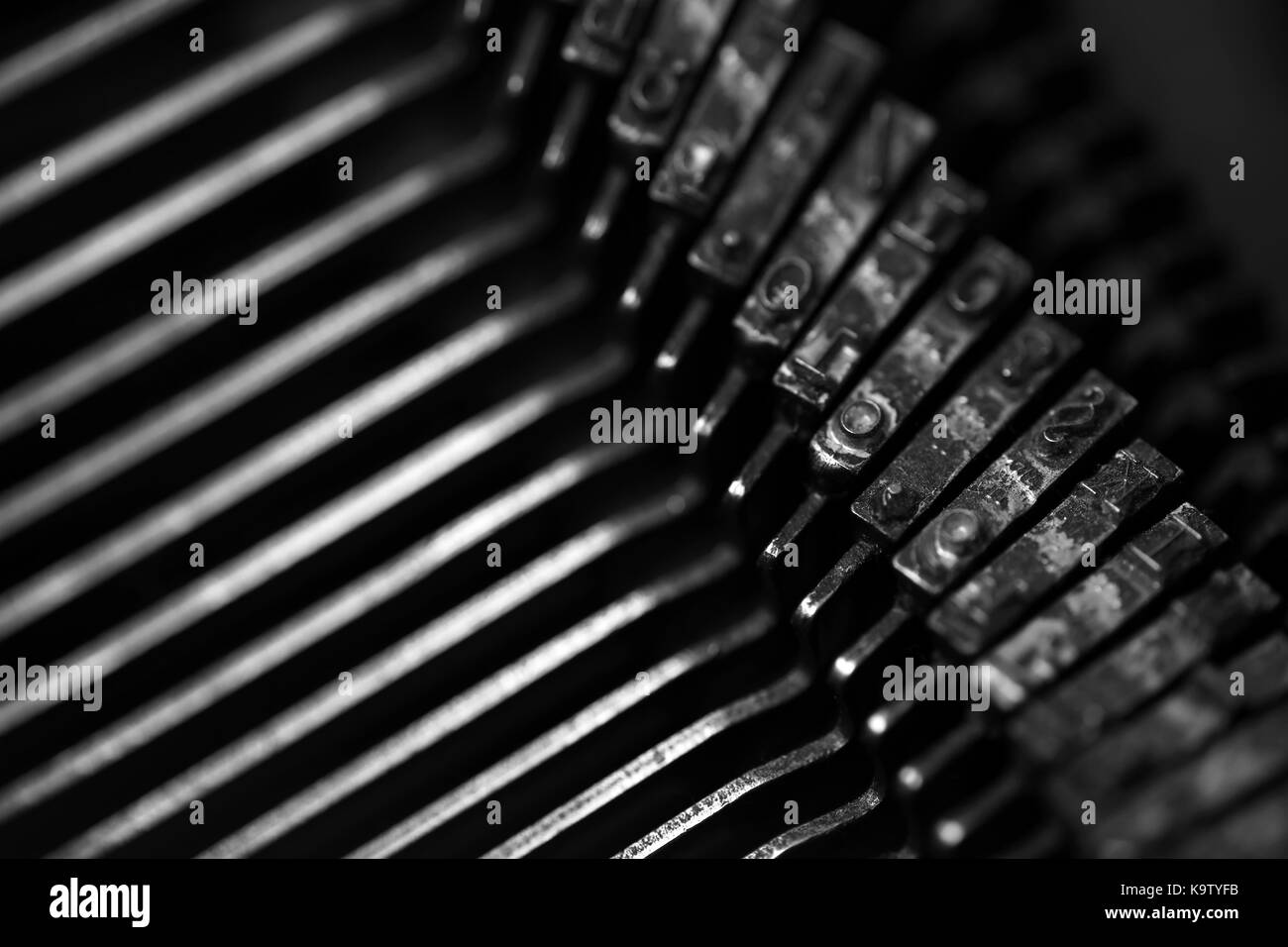 Different small metal elements of an old typewriter Stock Photo - Alamy