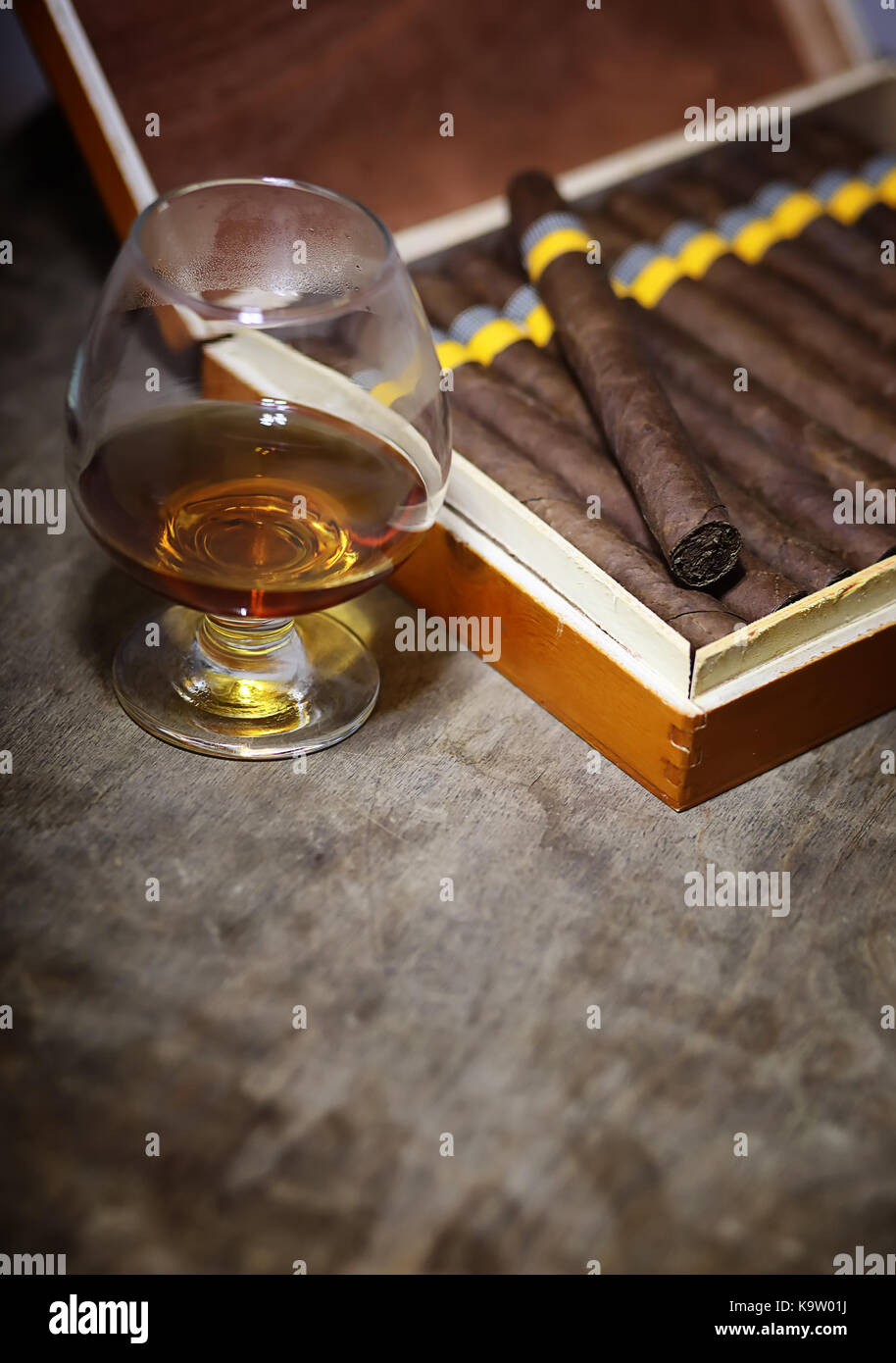 Large box of Cuban cigars on a wooden table Stock Photo - Alamy
