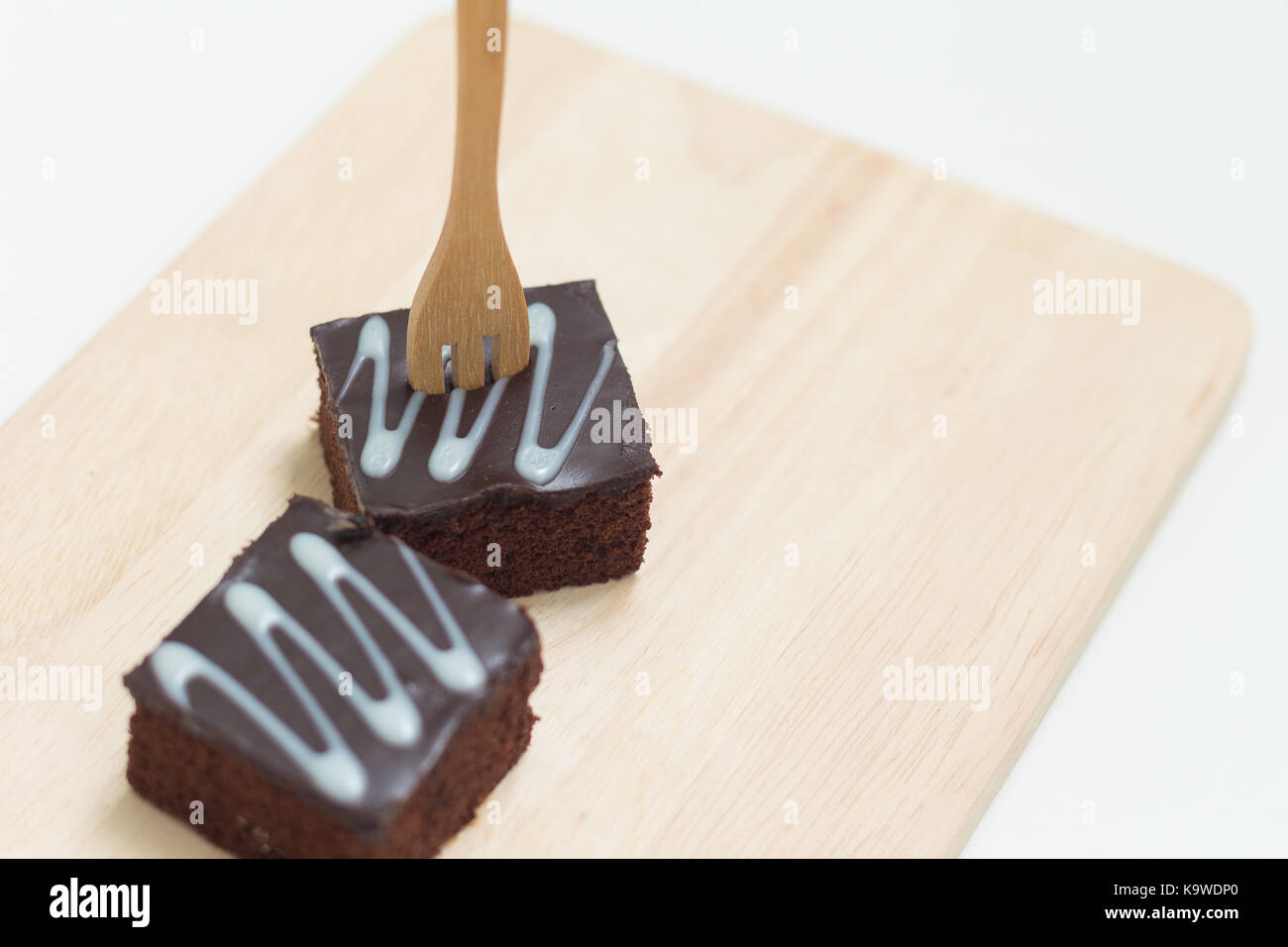 Fresh chocolate brownies on wood plate and ready for serving Stock ...