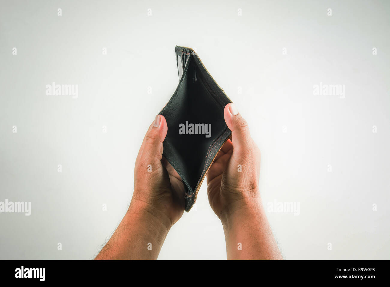 wallet in hand on white background Stock Photo - Alamy