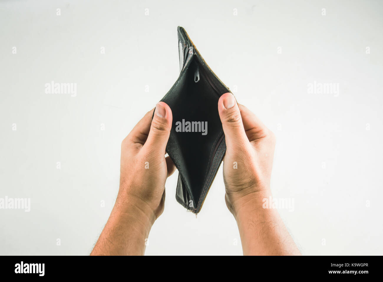 wallet in hand on white background Stock Photo - Alamy