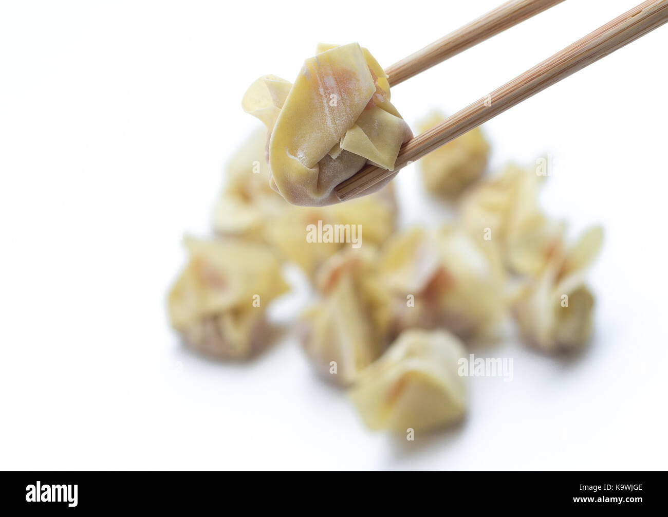 Homemade steamed dumplings stuffed with pork isolated on white ...