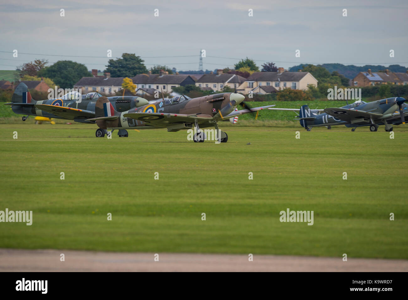 Duxford, UK. 23rd September, 2017. A formation of 12 spitfires forms up ...