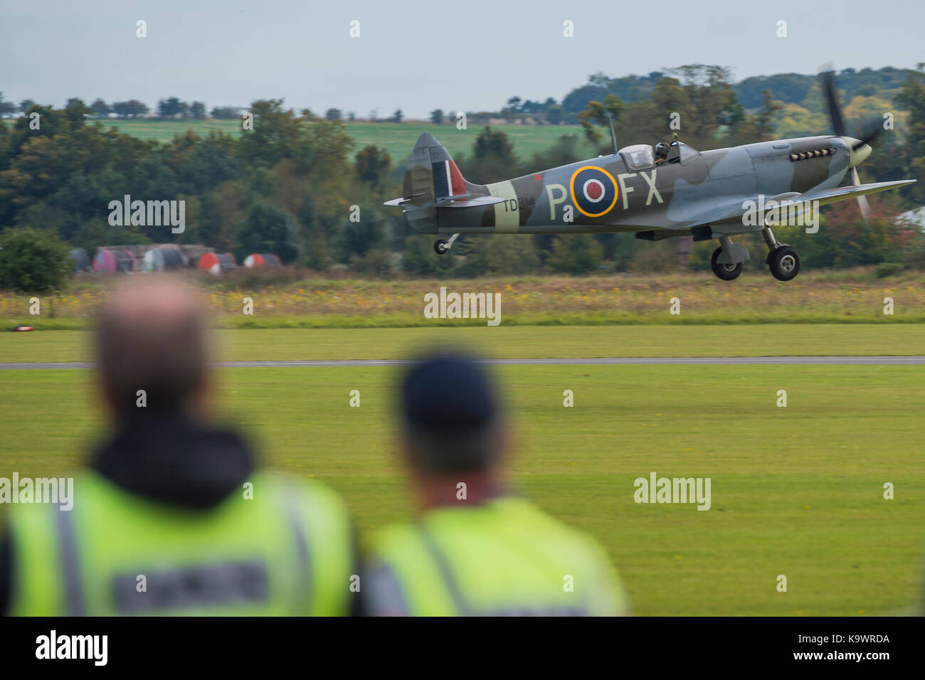 Duxford, UK. 23rd September, 2017. A formation of 12 spitfires forms up ...